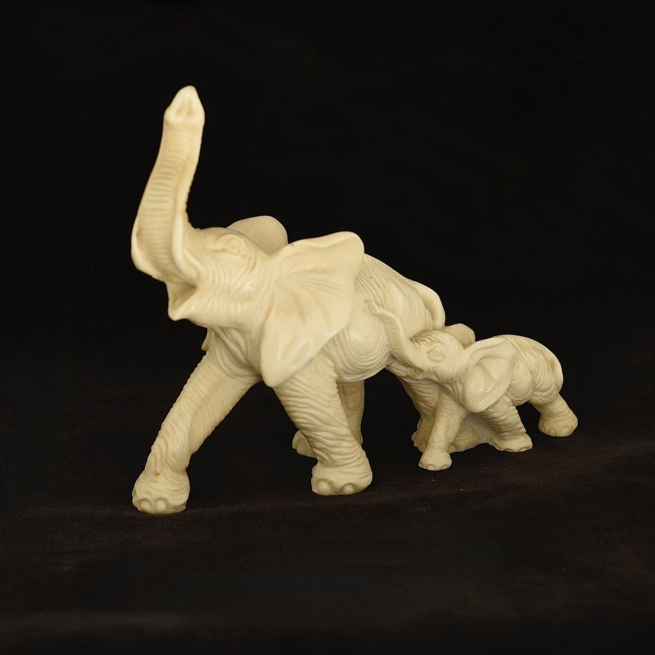 Vintage Hand Carved Mother & Baby Ivory Elephants | QUIET WEST